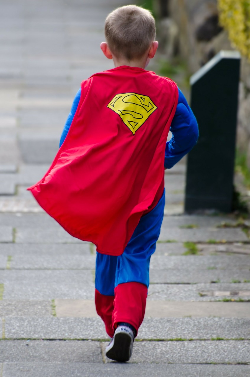 Child in Superman Costume - Roam Strong